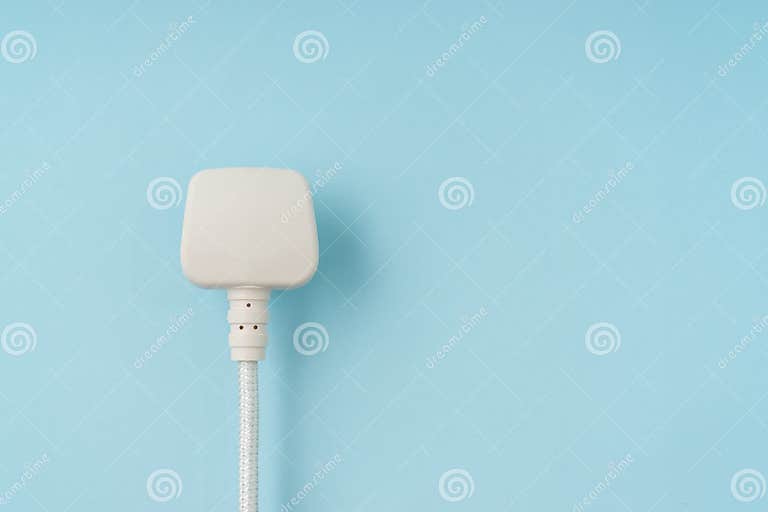 Three Pin Plug on Light Blue Background with a Copy Space Stock Image ...
