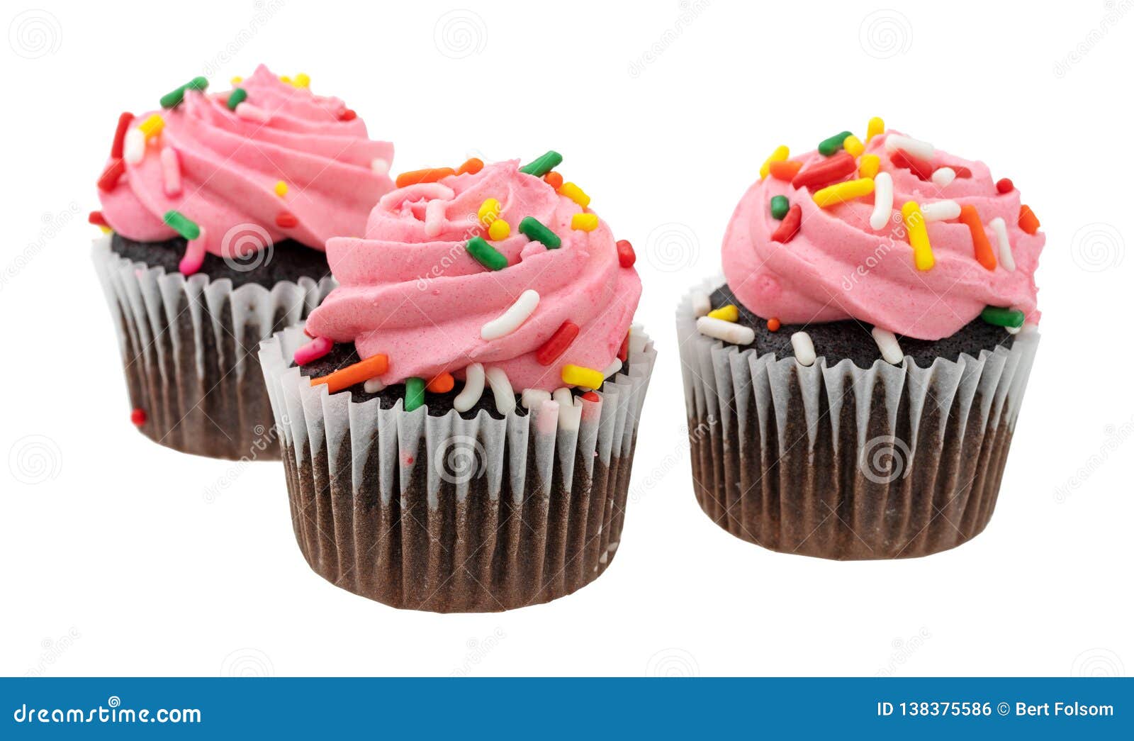Three Pink Frosted Chocolate Cupcakes Isolated on a White Background ...