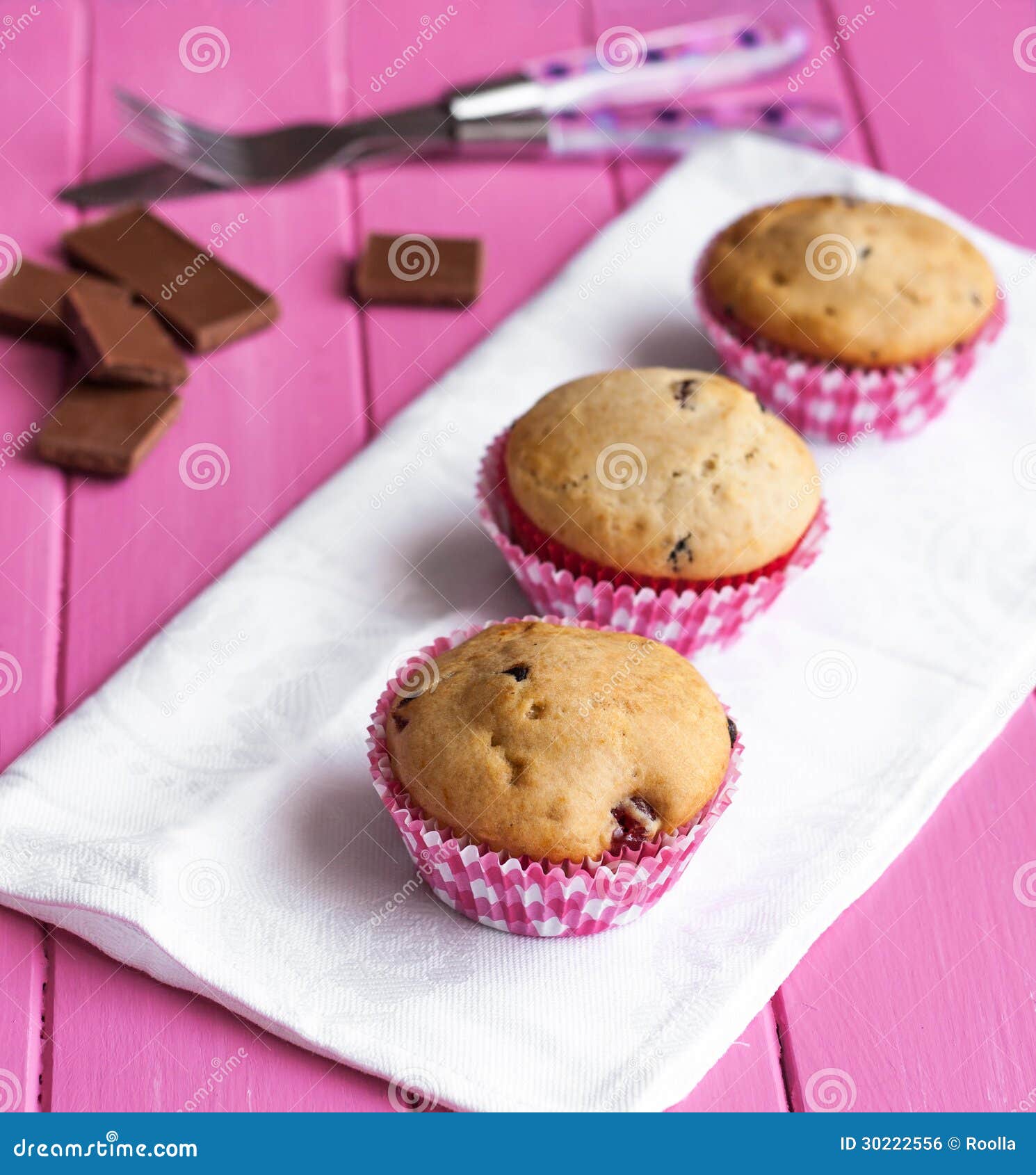 Three pink muffins stock photo. Image of baking, baked - 30222556