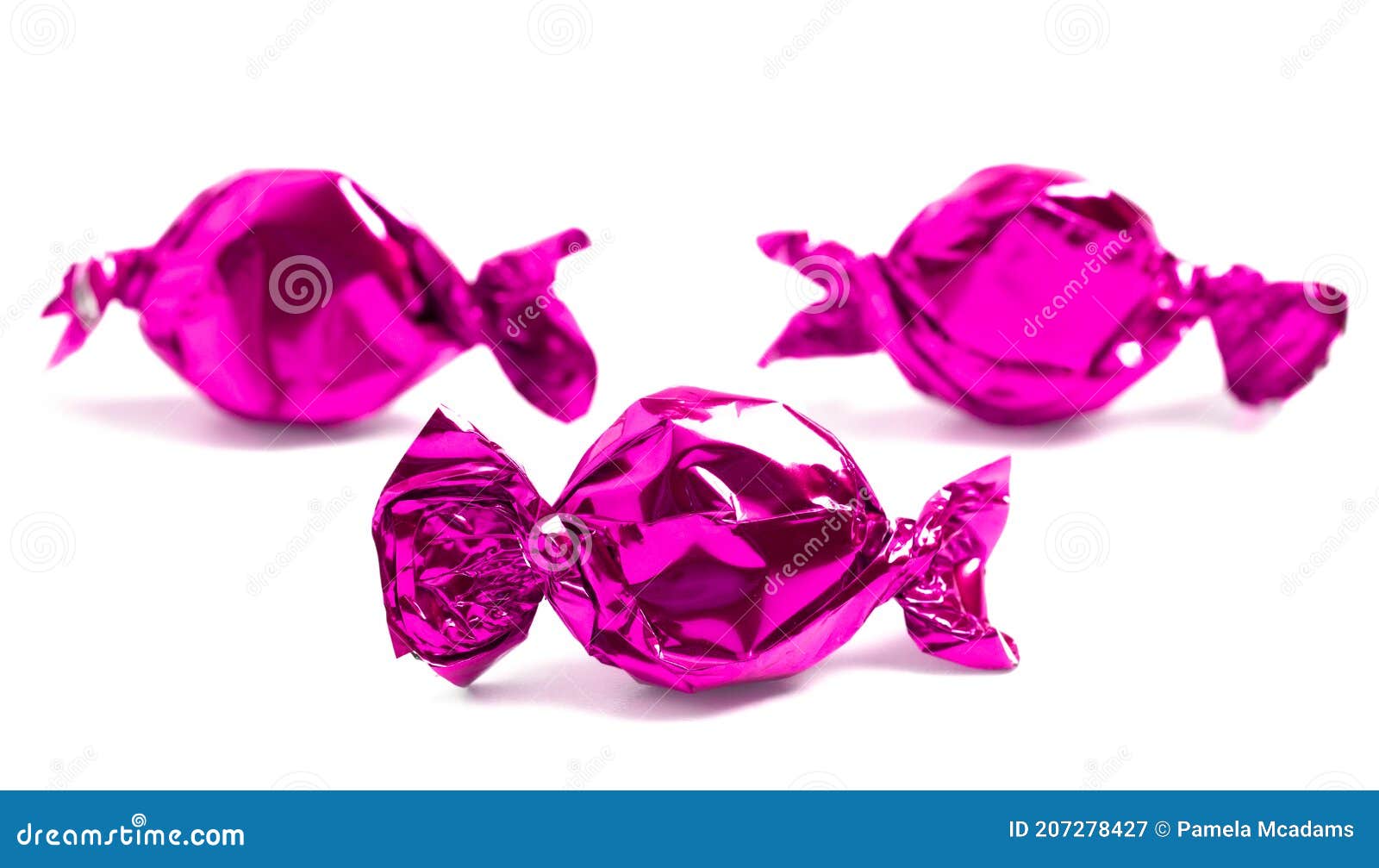 Three Pink Wrapped Candy on a White Background Stock Image - Image of ...