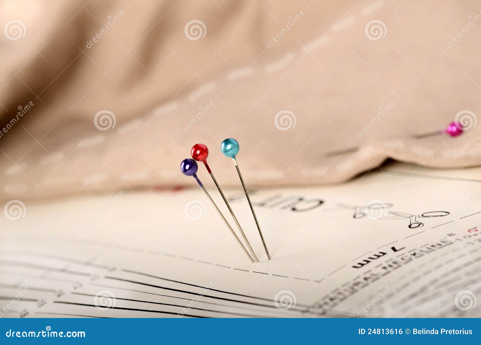 Three Pins on a Pattern with Material Stock Photo - Image of cutting ...