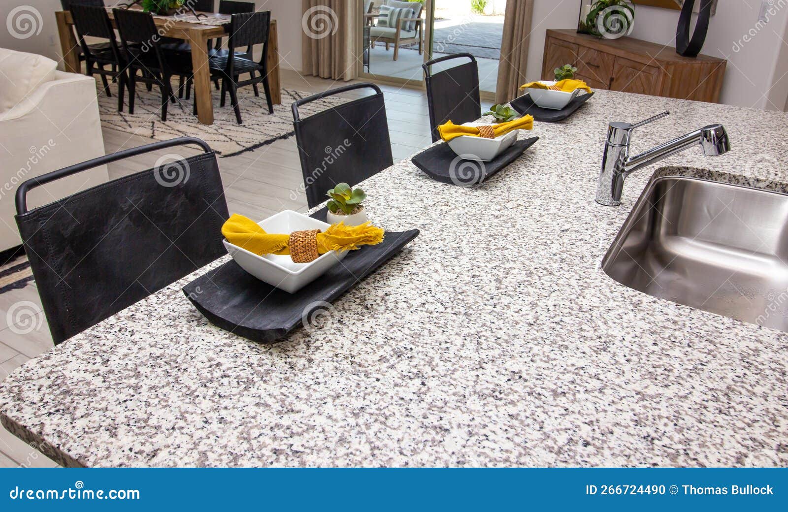 Three Place Settings on Kitchen Counter Island Stock Photo - Image of ...