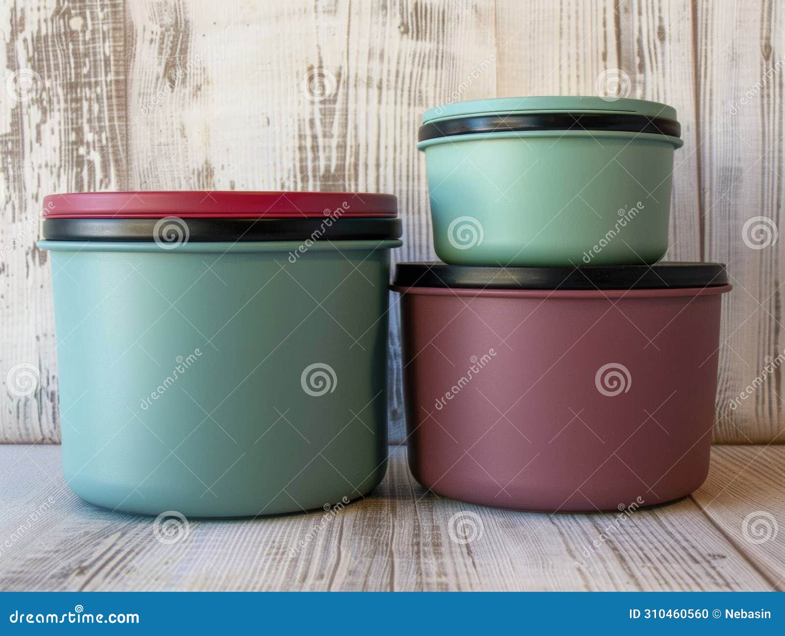 Three Plastic Containers of Different Sizes are Stacked on Top of Each ...
