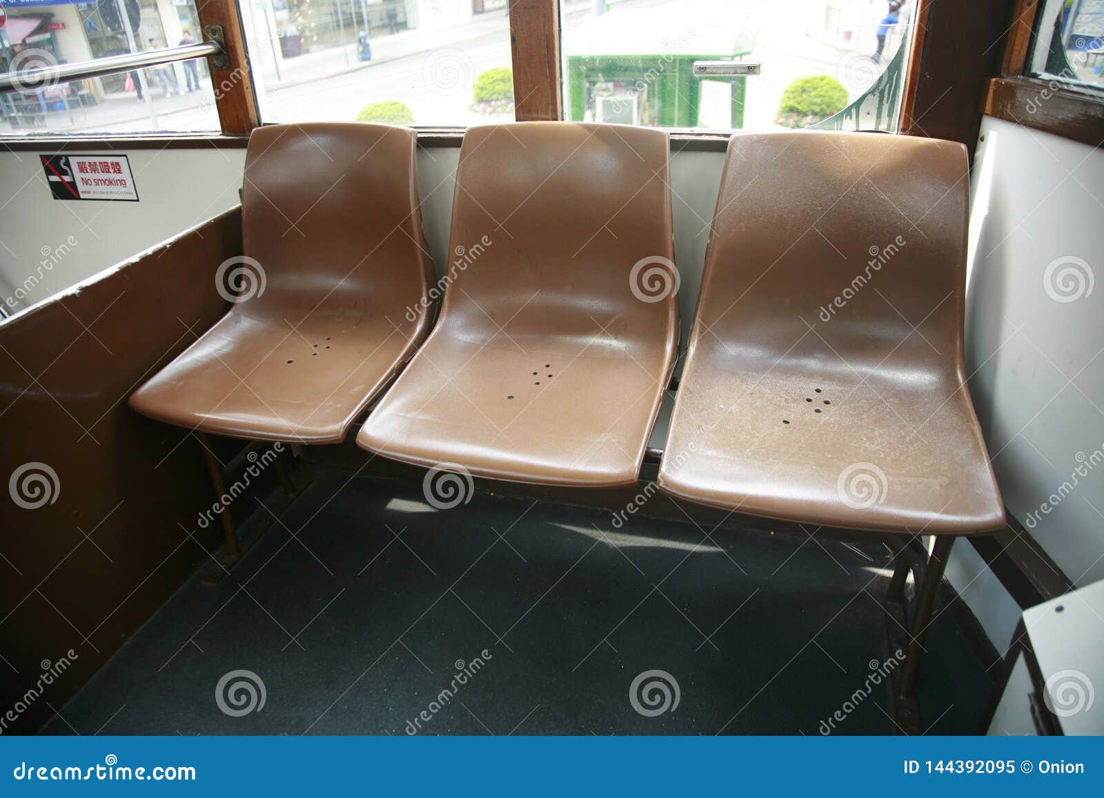 Three Plastic Moulded Seats in a Hong Kong Tram Stock Image - Image of ...