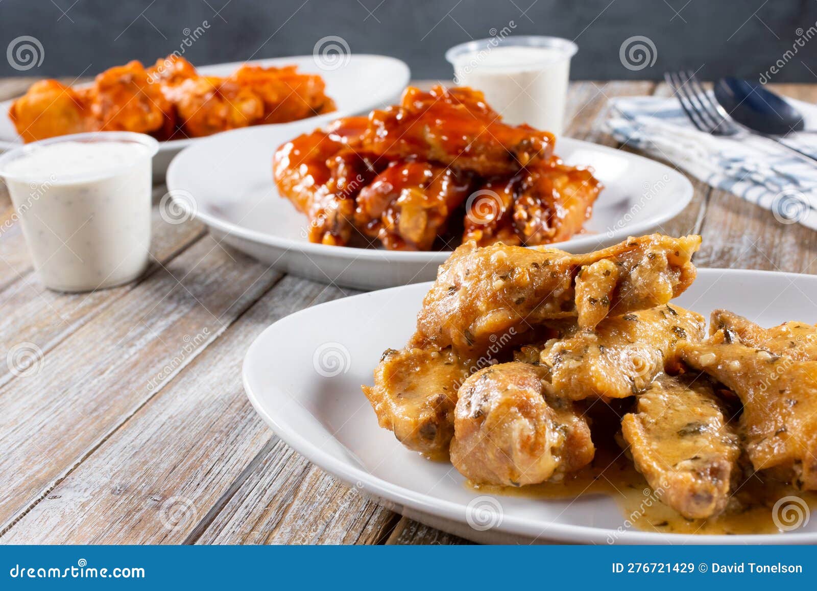 Three Plates of Assorted Chicken Wings Stock Image - Image of entree ...
