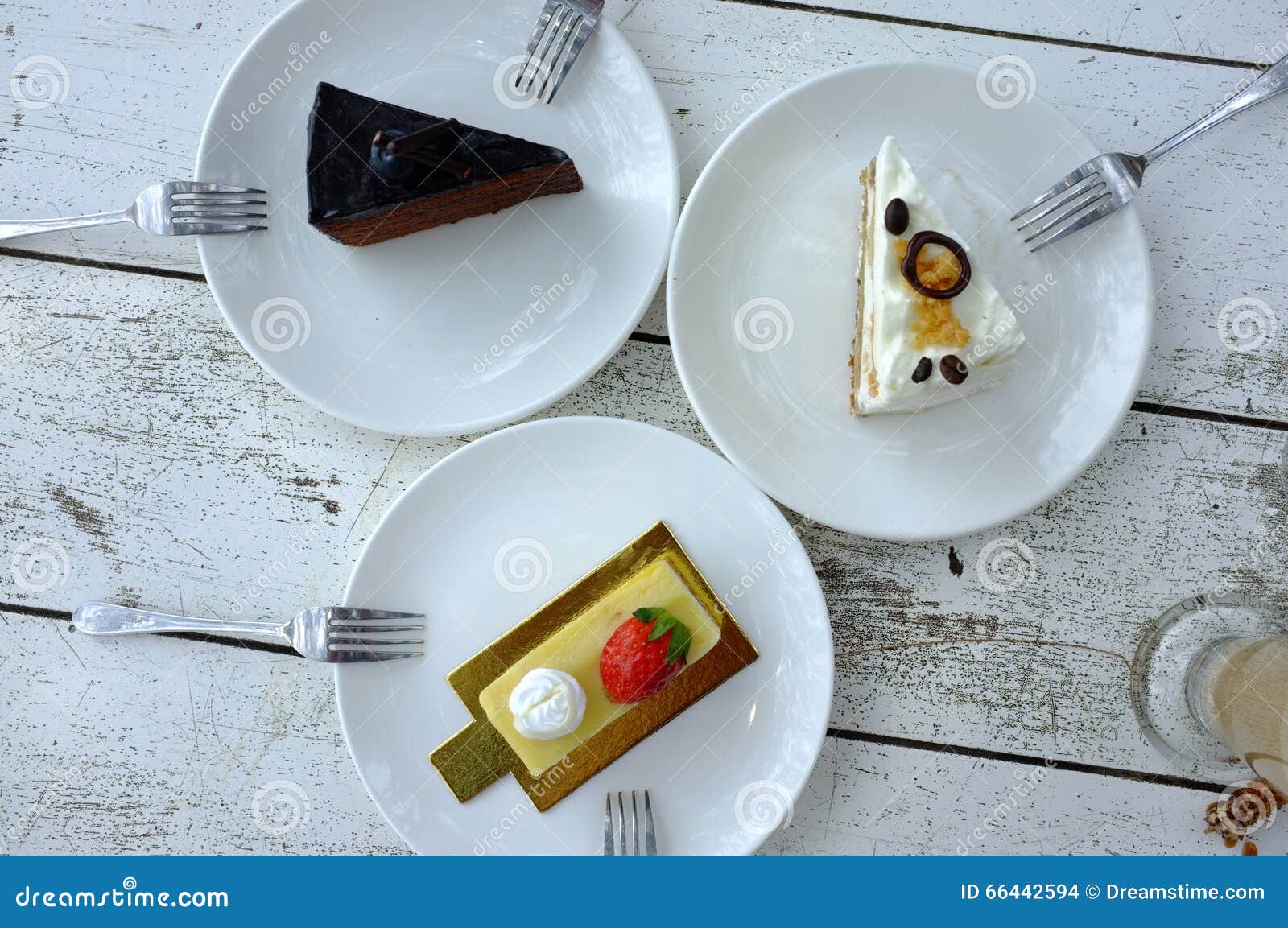Three plates of dessert stock photo. Image of table, dessert - 66442594