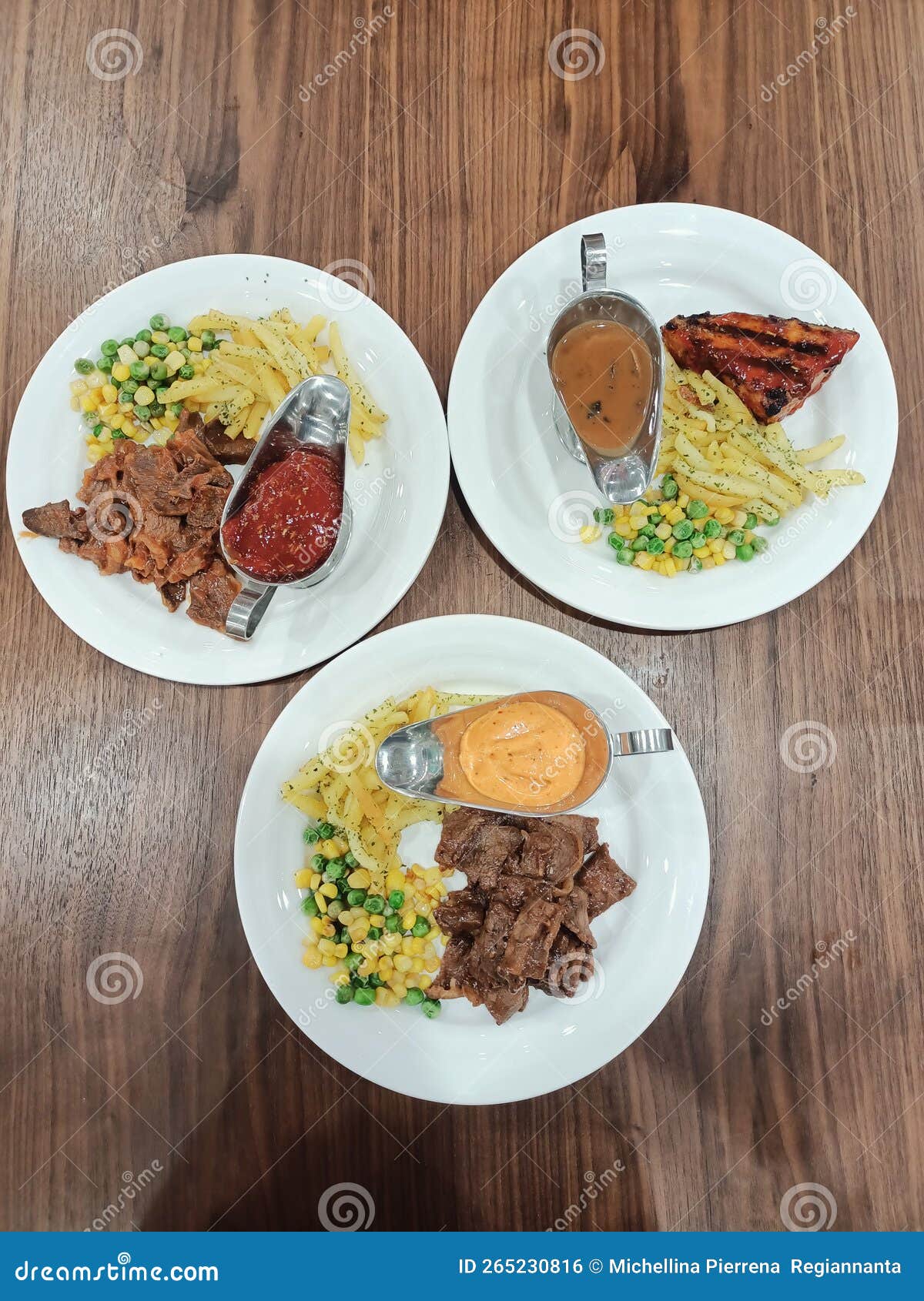 Three plates of steak stock photo. Image of three, meal - 265230816