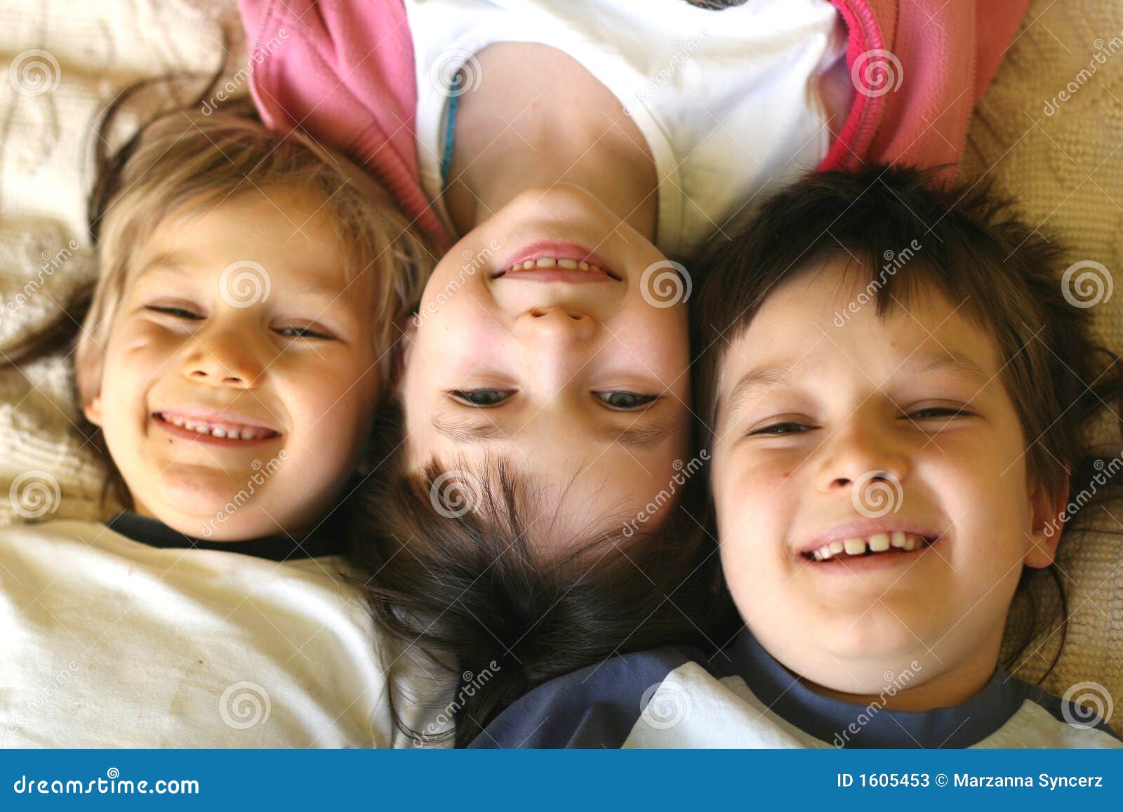 Three Playful Children stock image. Image of friendly - 1605453