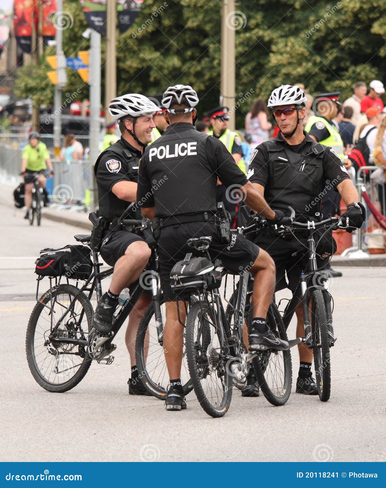 Three Policemen on Bikes editorial photo. Image of summer - 20118241