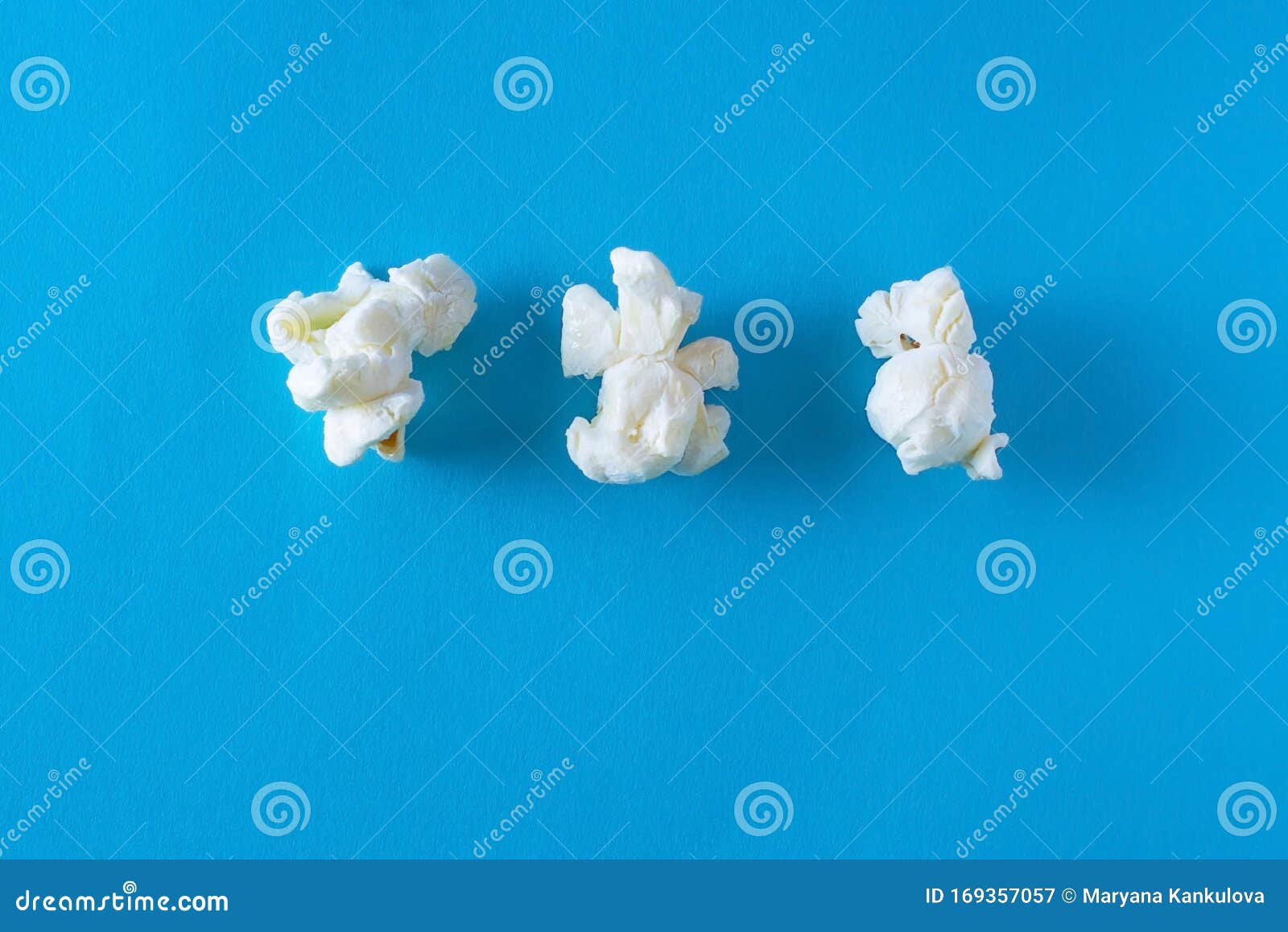Three Popcorn on a Bright Blue Background, Design Concept Stock Image ...