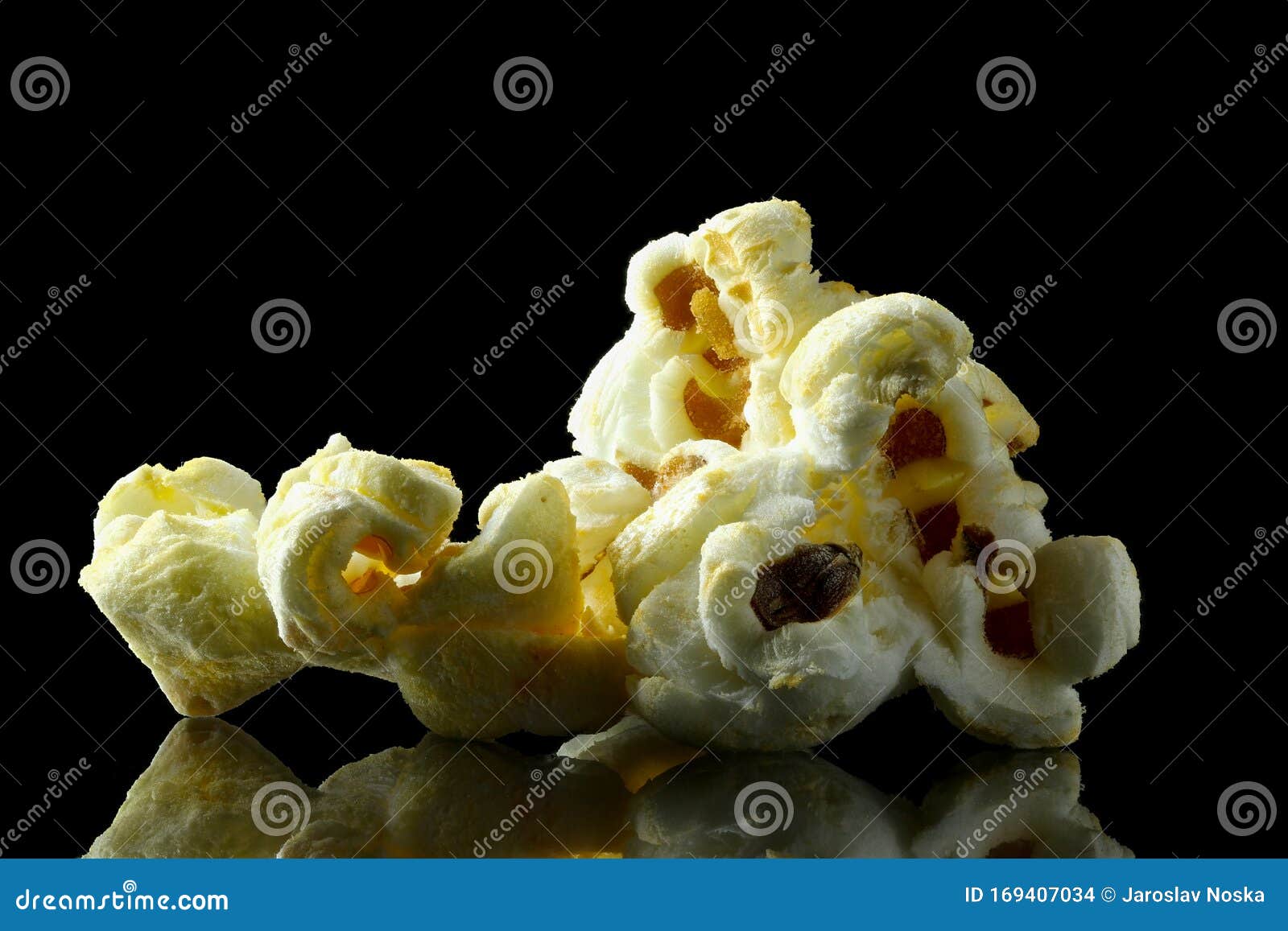 Three Popcorn Isolated on Black Background with Reflection Stock Photo ...