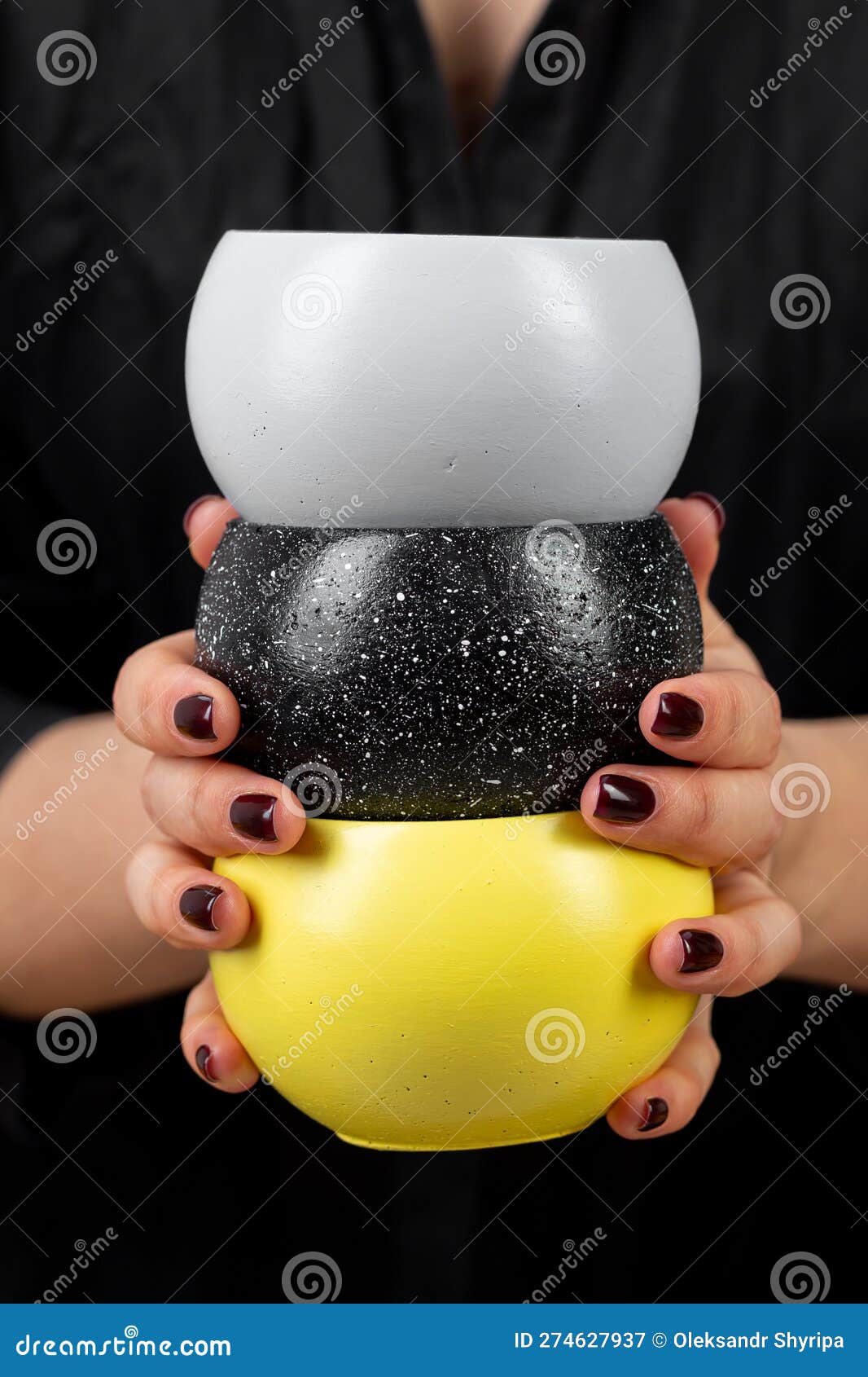 Three Pots of Different Colors in a Woman S Hand Stock Image - Image of ...