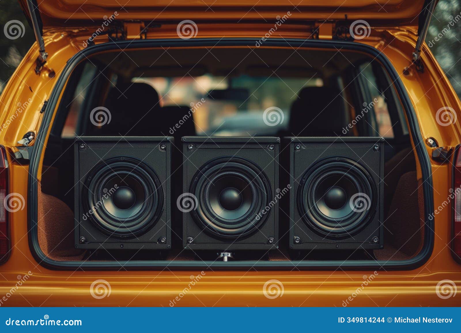 Three Powerful Subwoofers Lying in Modern Car Trunk Stock Photo - Image ...