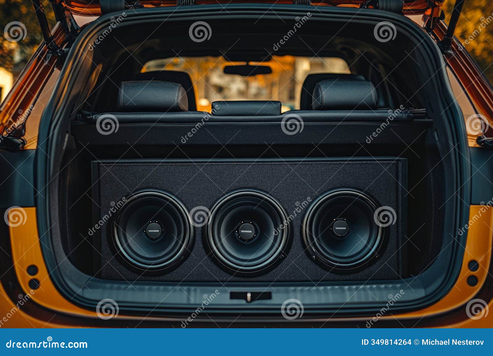 Three Powerful Subwoofers Lying in Modern Car Trunk Stock Photo - Image ...