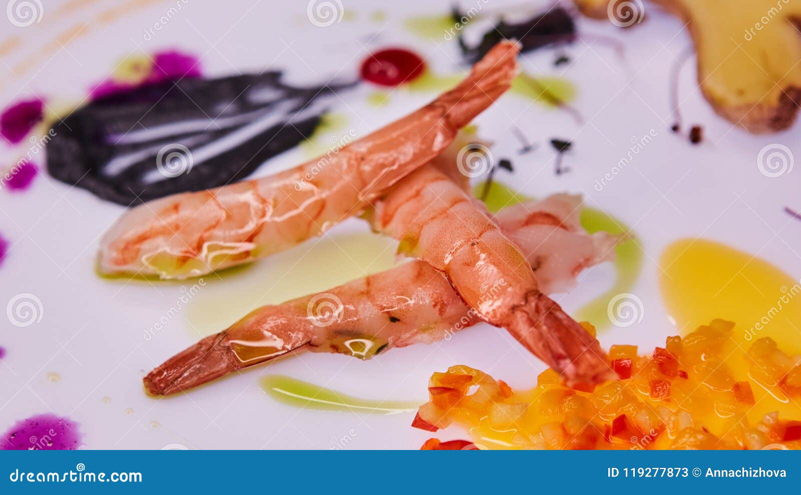 Three Prawns on a White Table Decorated with Chopped Vegetables and ...