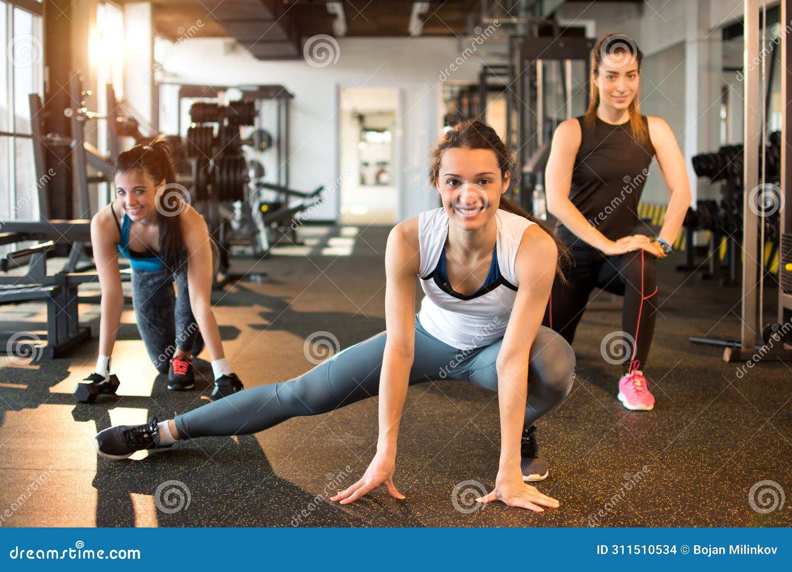 Three Pretty Girls Workout in the Gym Stock Photo - Image of ...