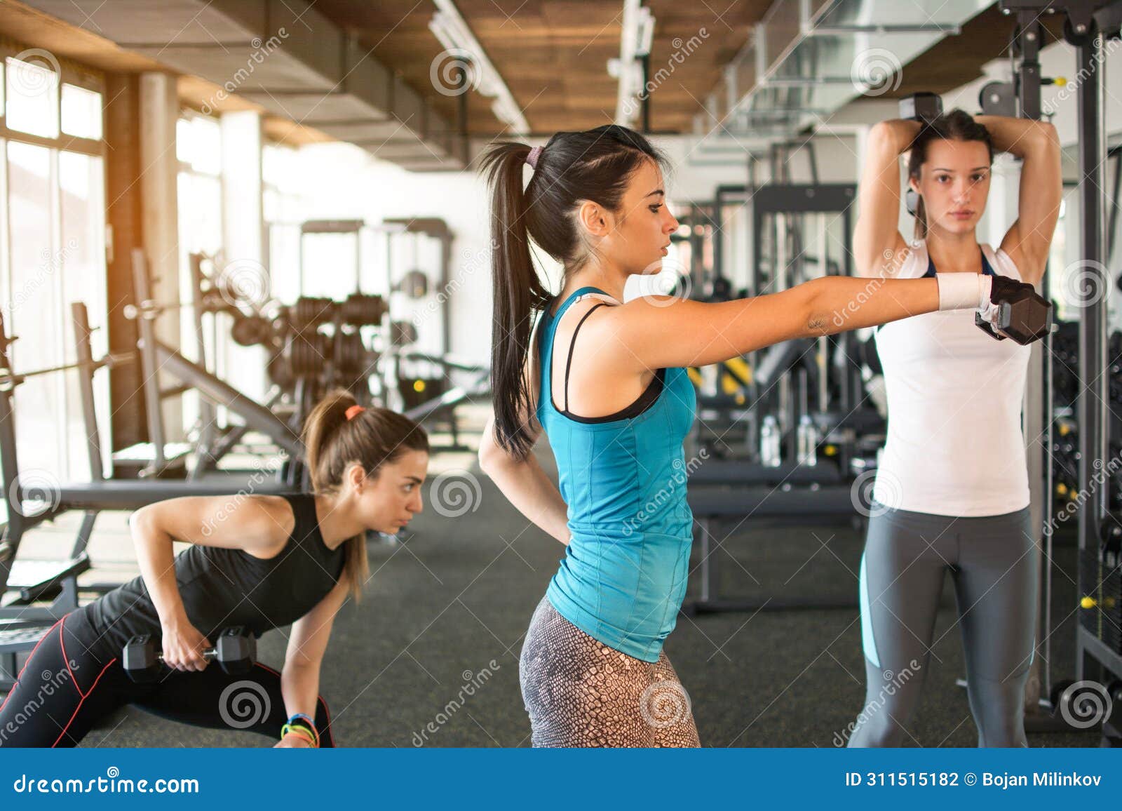 Three Pretty Girls Workout in the Gym Stock Photo - Image of attractive ...