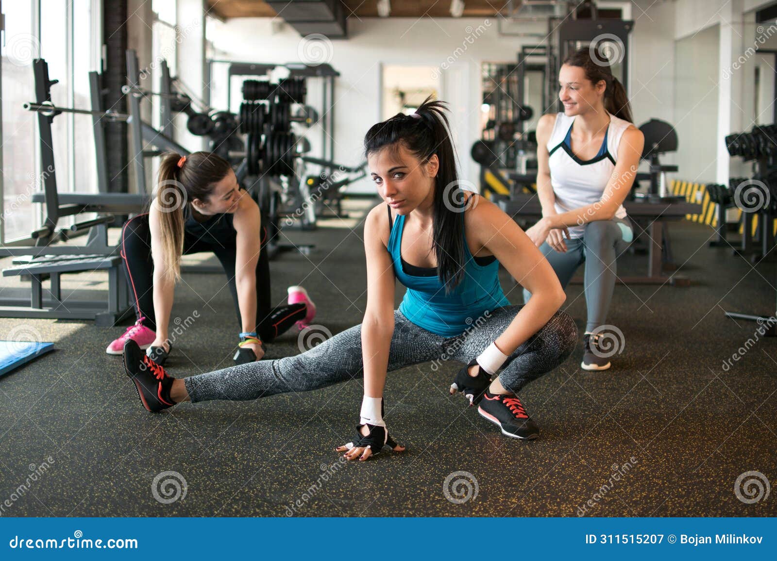 Three Pretty Girls Workout in the Gym Stock Image - Image of athletic ...