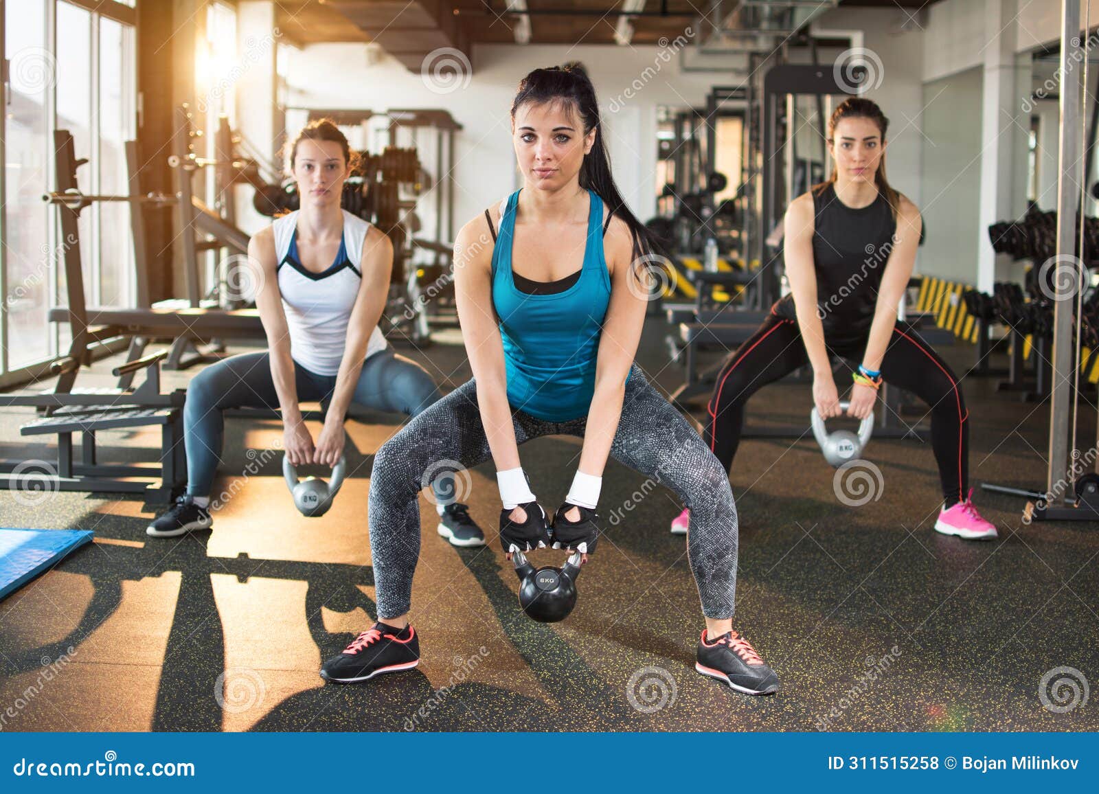 Three Pretty Girls Workout in the Gym Stock Photo - Image of attractive ...