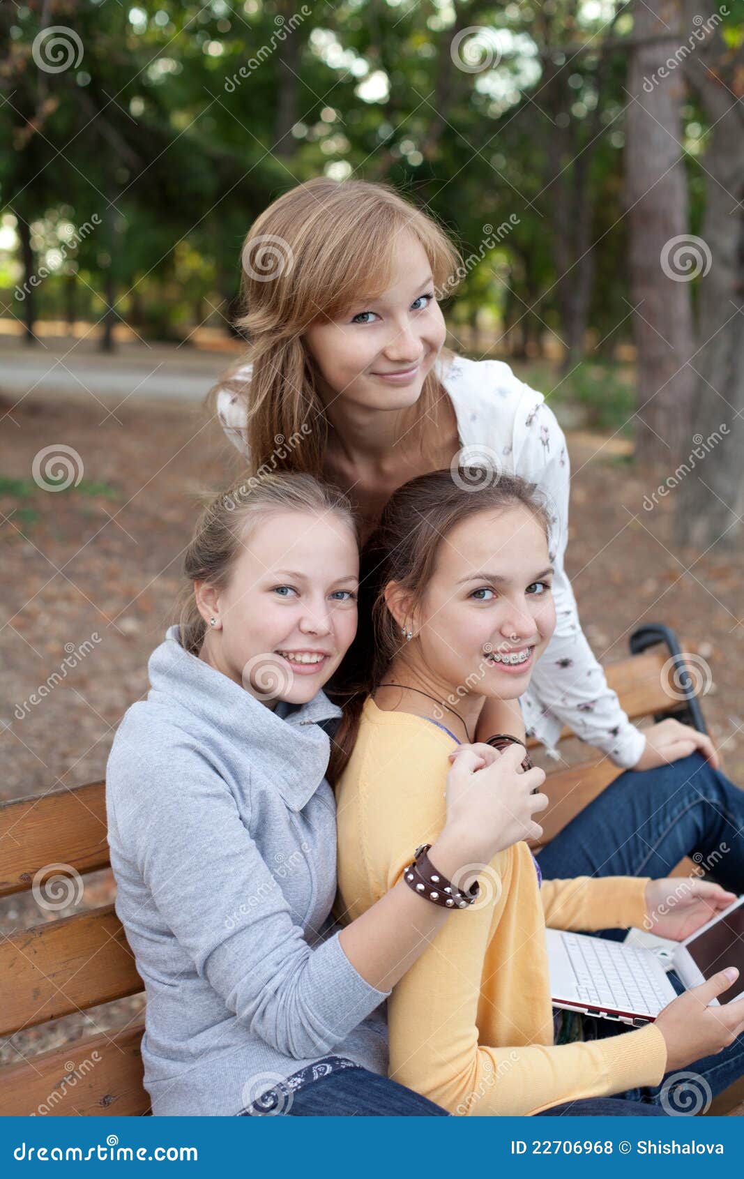 Three Pretty Student Girls Urfing the Internet Stock Photo - Image of ...