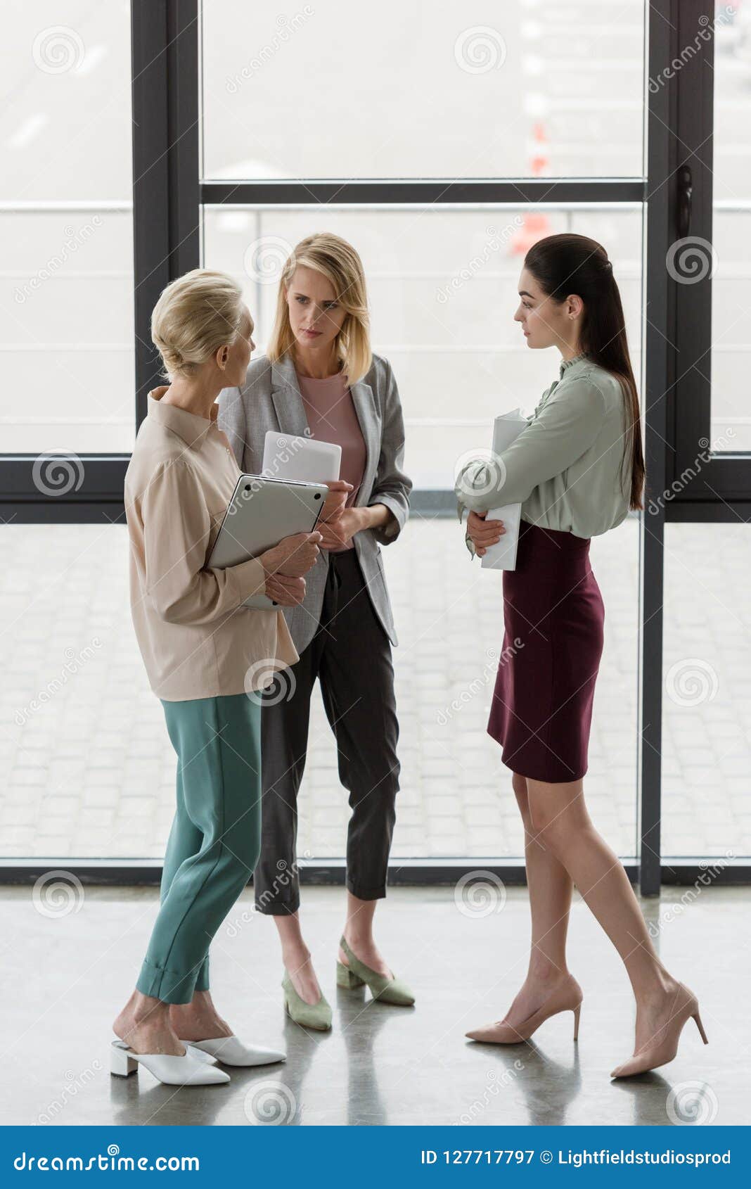 Three Professional Businesswomen Talking Stock Image - Image of ...