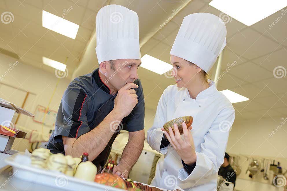 Three Professional Chefs Working in Commercial Kitchen Stock Image ...