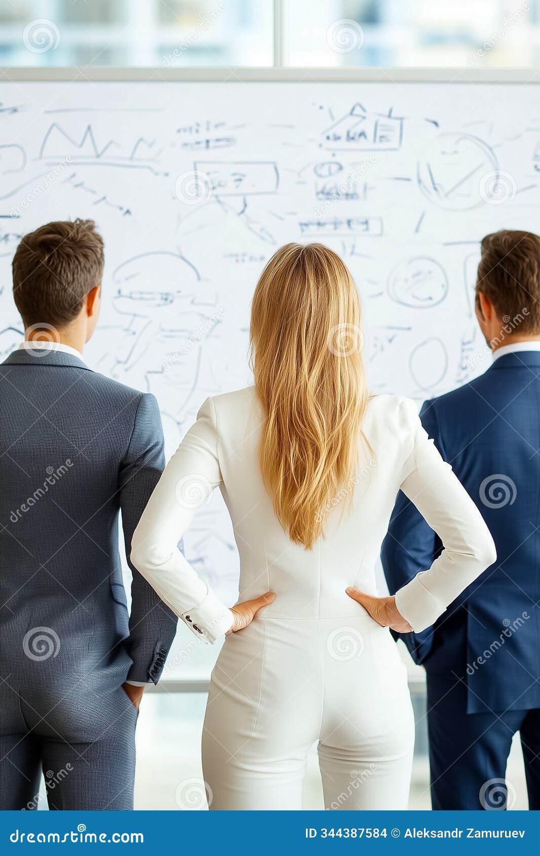 Three Professionals Observe a Whiteboard Filled with Data Visuals ...