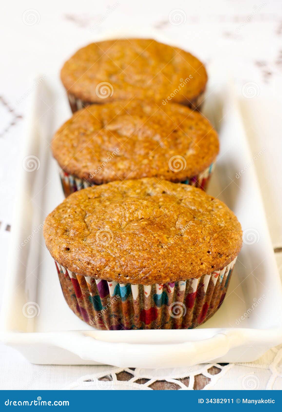 Three pumpkin muffins stock image. Image of dessert, pastry - 34382911