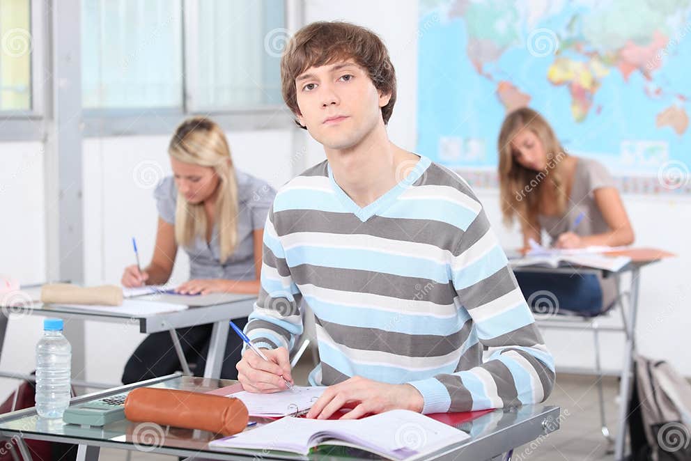 Three pupils in classroom stock photo. Image of student - 35204720