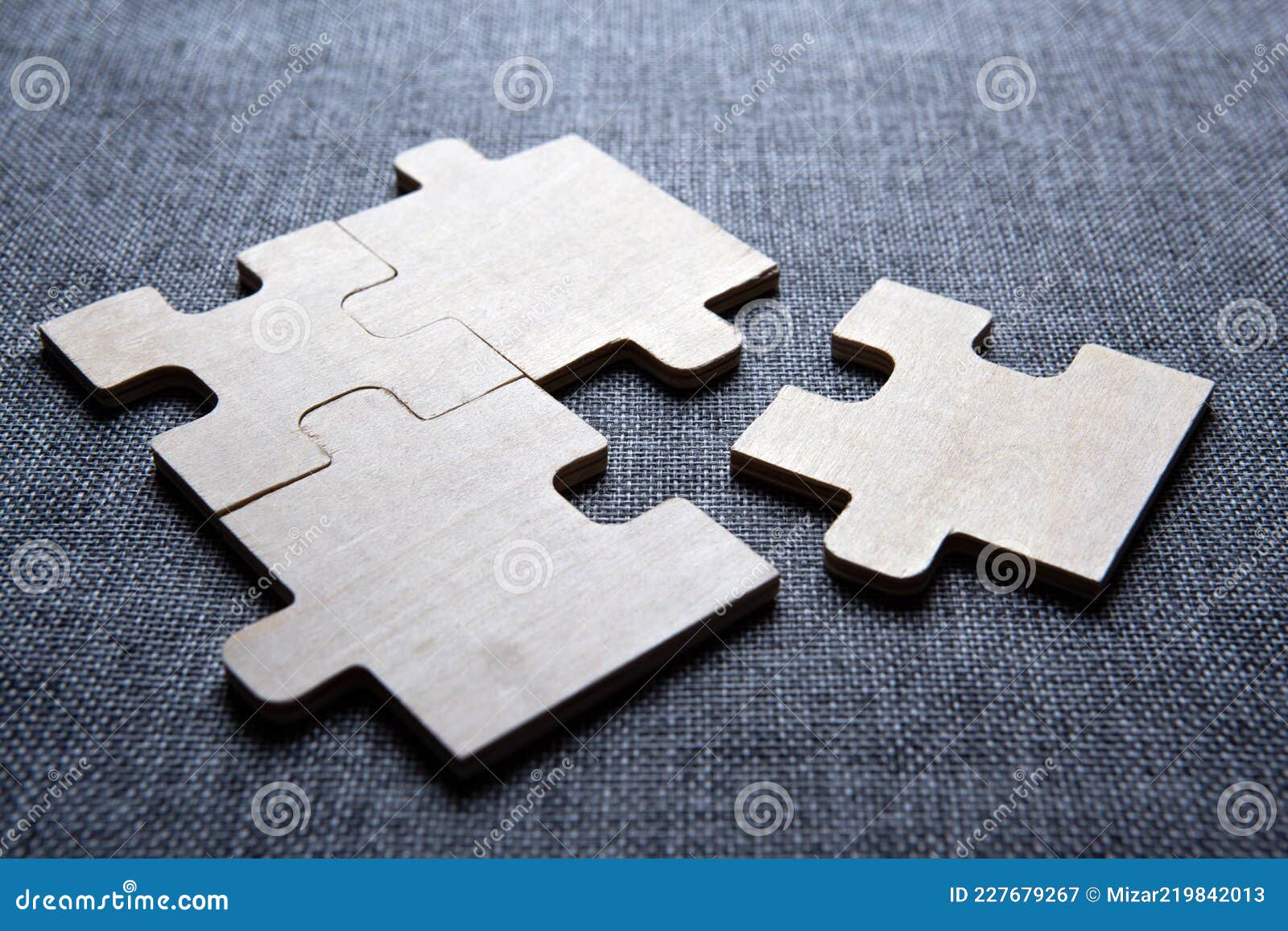 Three Puzzle Pieces in a Row on a Textile Background Stock Image ...