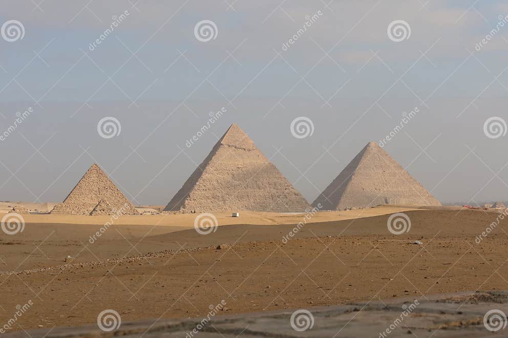 The Pyramids of Egypt Side by Side in the Middle of Desert Sand with ...