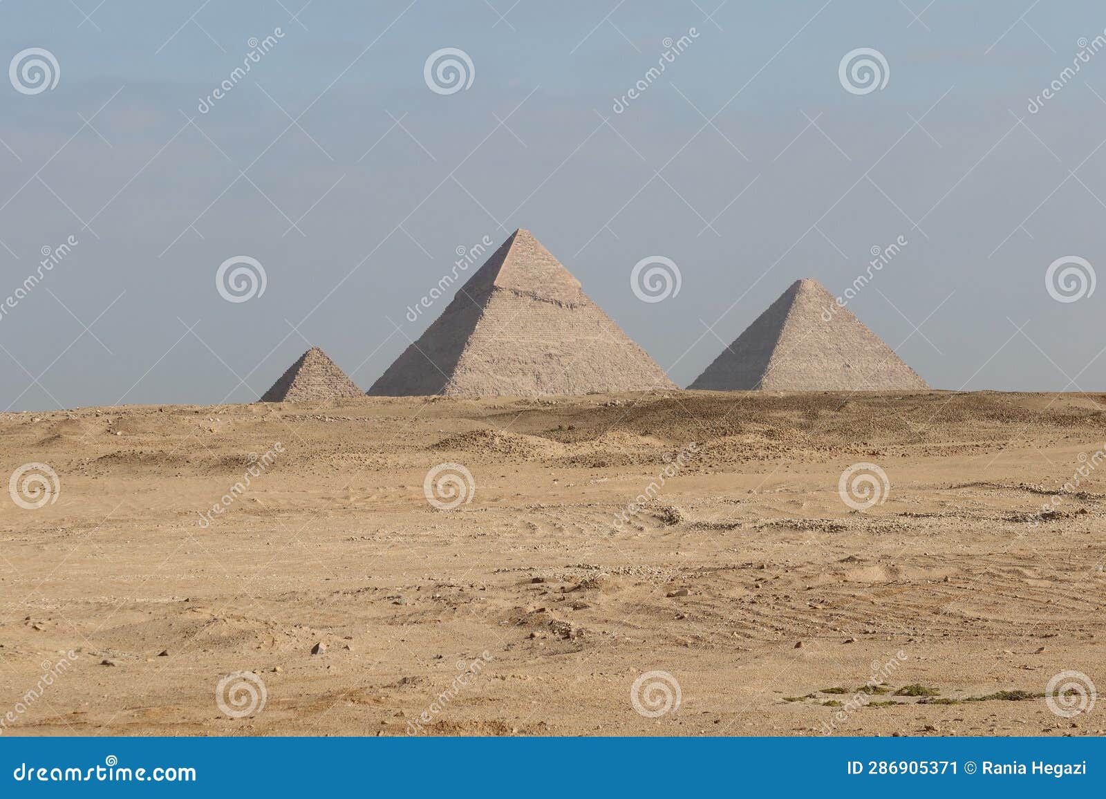 The Pyramids of Egypt Side by Side in the Middle of Desert Sand with ...