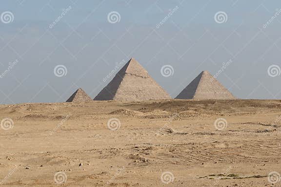 The Pyramids of Egypt Side by Side in the Middle of Desert Sand with ...