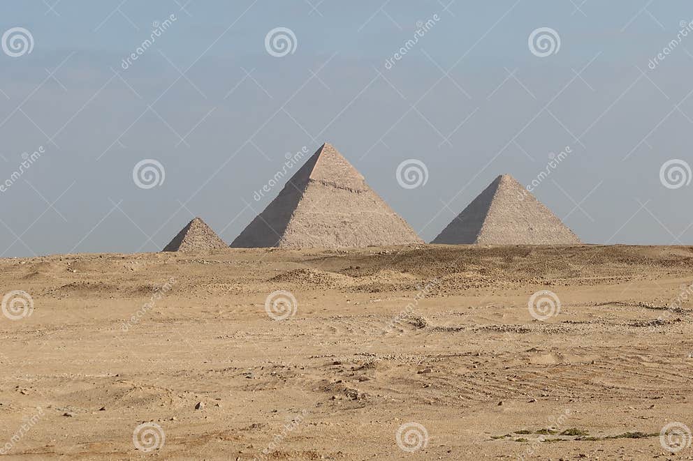 The Pyramids of Egypt Side by Side in the Middle of Desert Sand with ...