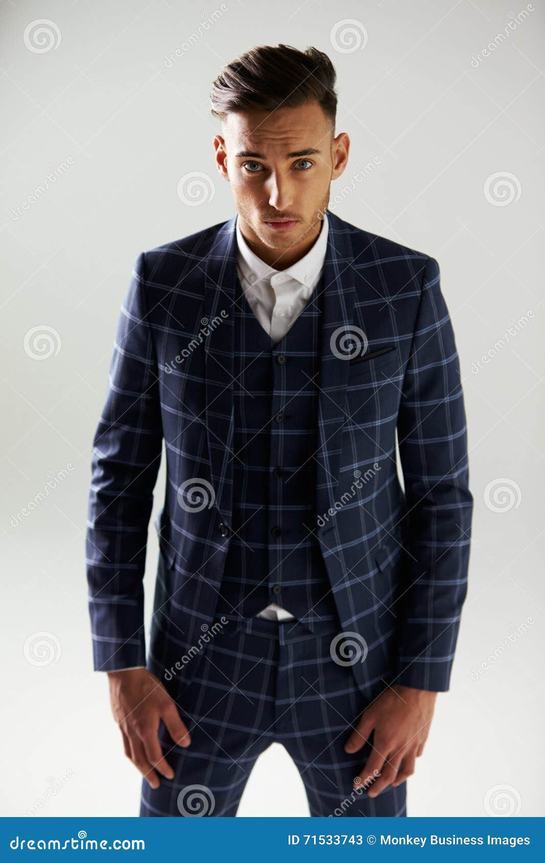 Three Quarter Length Front View of Young Man Wearing Suit Stock Image ...