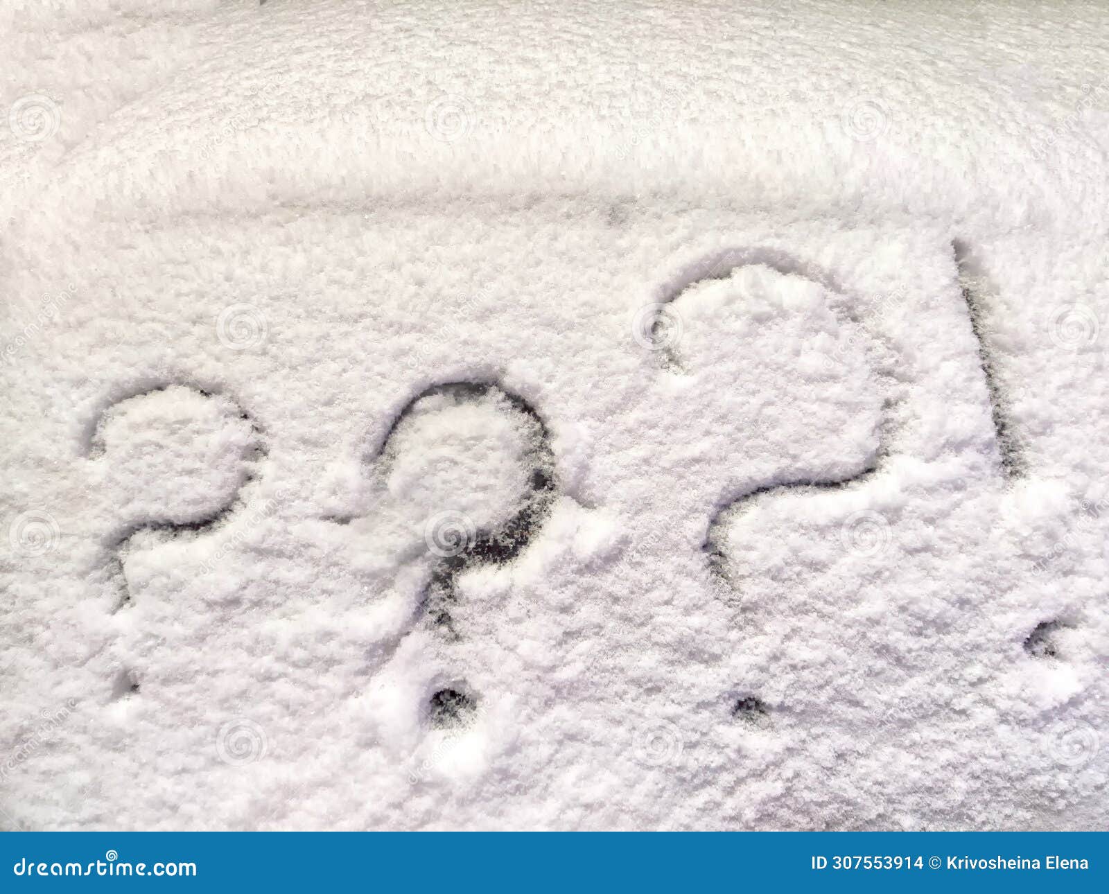 Three Question and Exclamation Marks Written in the Snow. the Cold ...