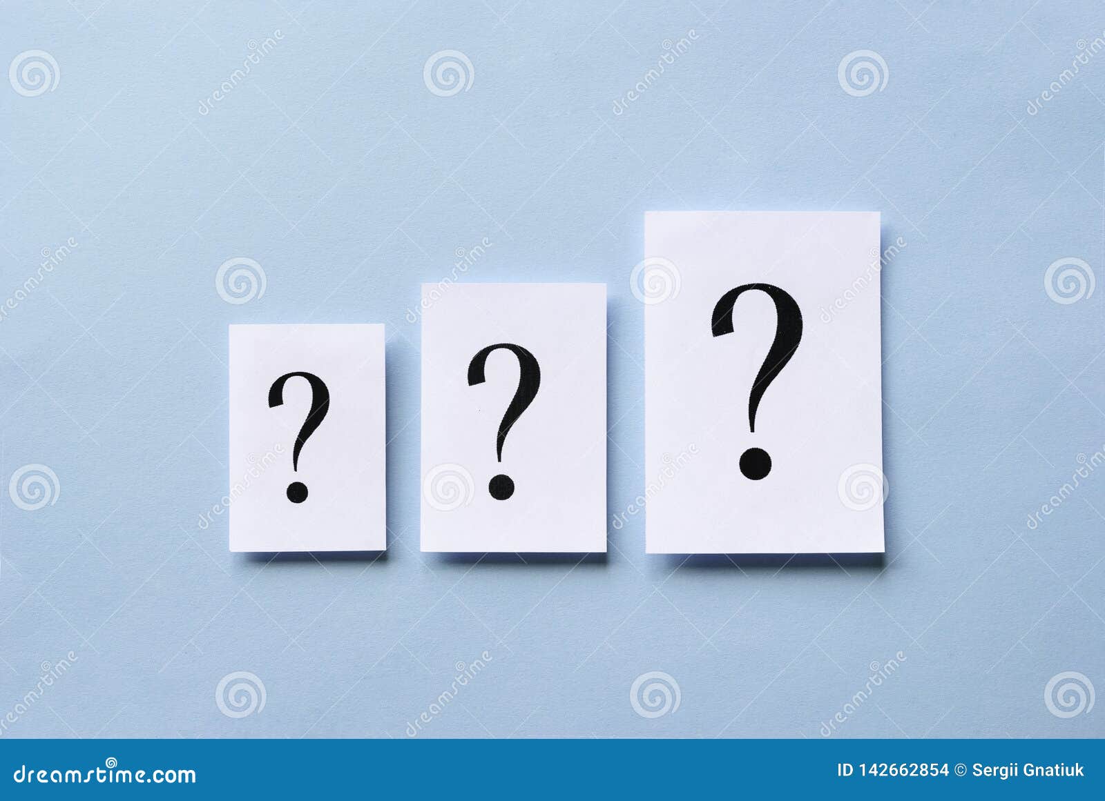 Three Question Marks of Different Size on Card Stock Photo - Image of ...