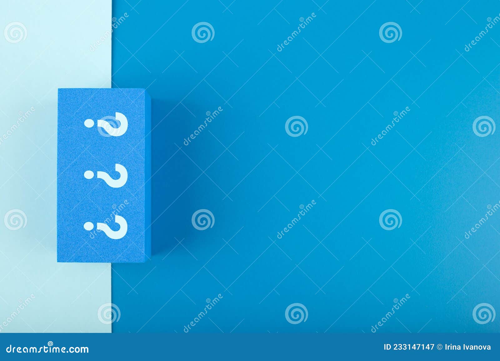 Three Question Marks on Blue Rectangle on Monochromatic Blue Background ...