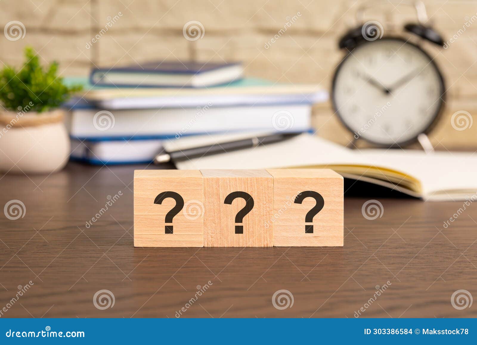 Close-up Three Question Marks on Wooden Blocks. Wooden Cubes with ...
