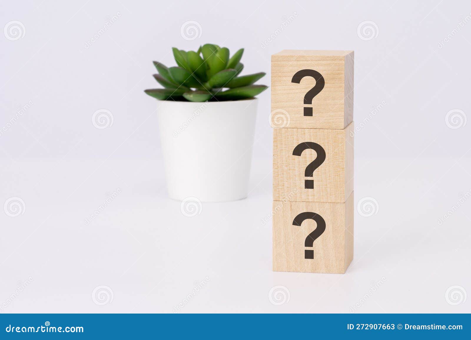 Three Questions on Wooden Blocks in White Background with Copy Space ...