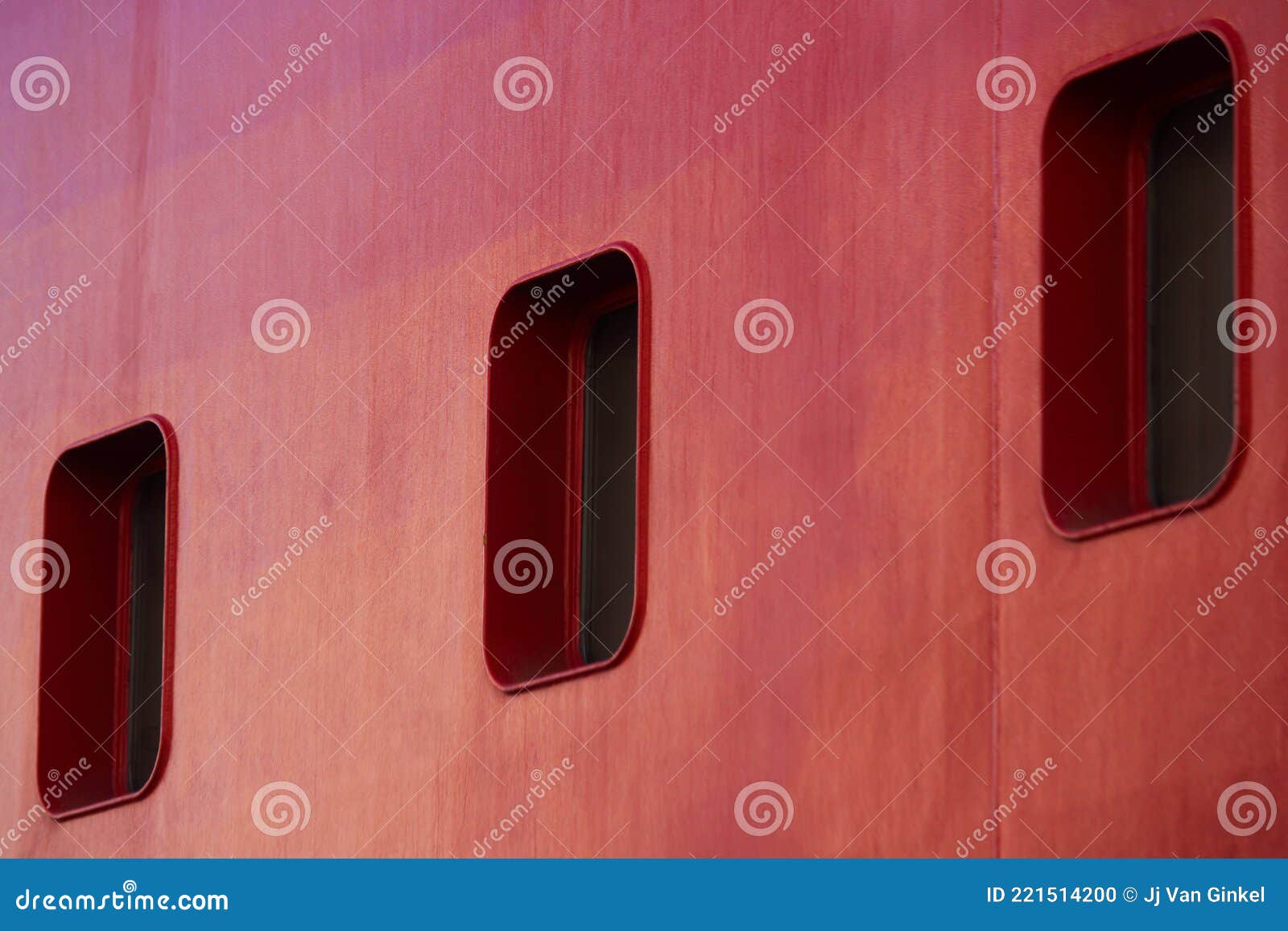 Three Rectangular Portholes on a Red Ship Hull Stock Photo - Image of ...