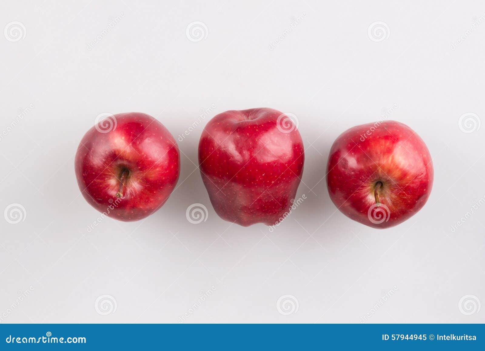 Three red apples on white stock image. Image of natural - 57944945