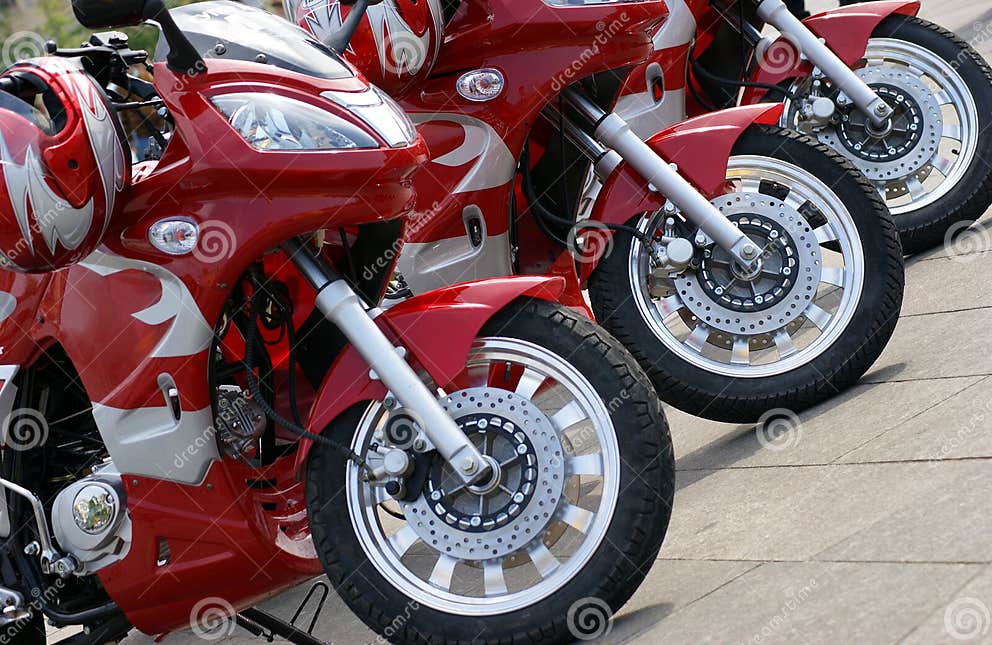 Three red motorcycles stock image. Image of lined, motorbike - 72620713