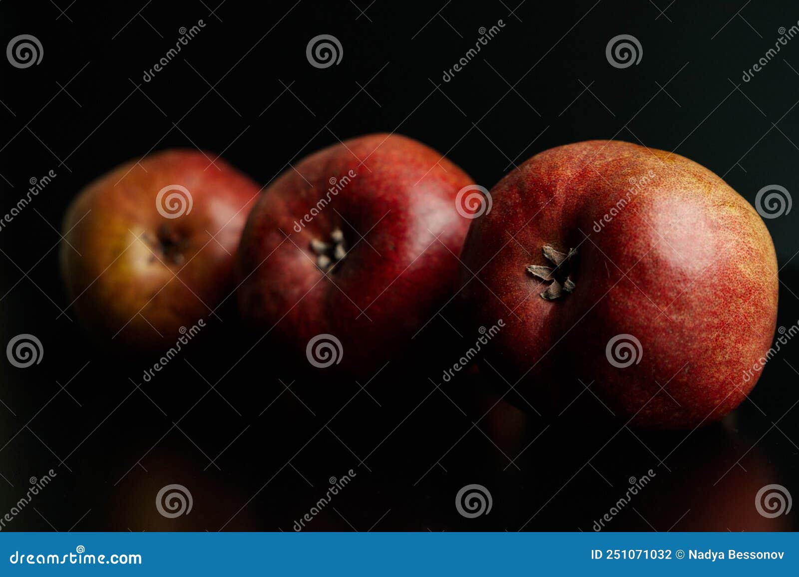 Three Red Pears on a Black Table Stock Photo - Image of table, natural ...