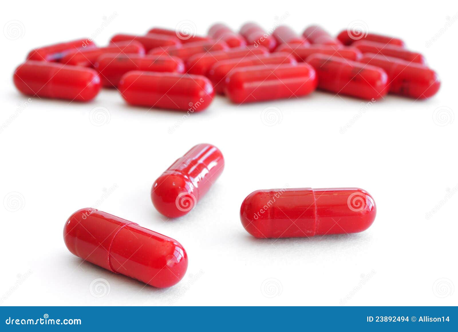 Three Red Pills (Capsules) with Many in Background Stock Photo - Image ...