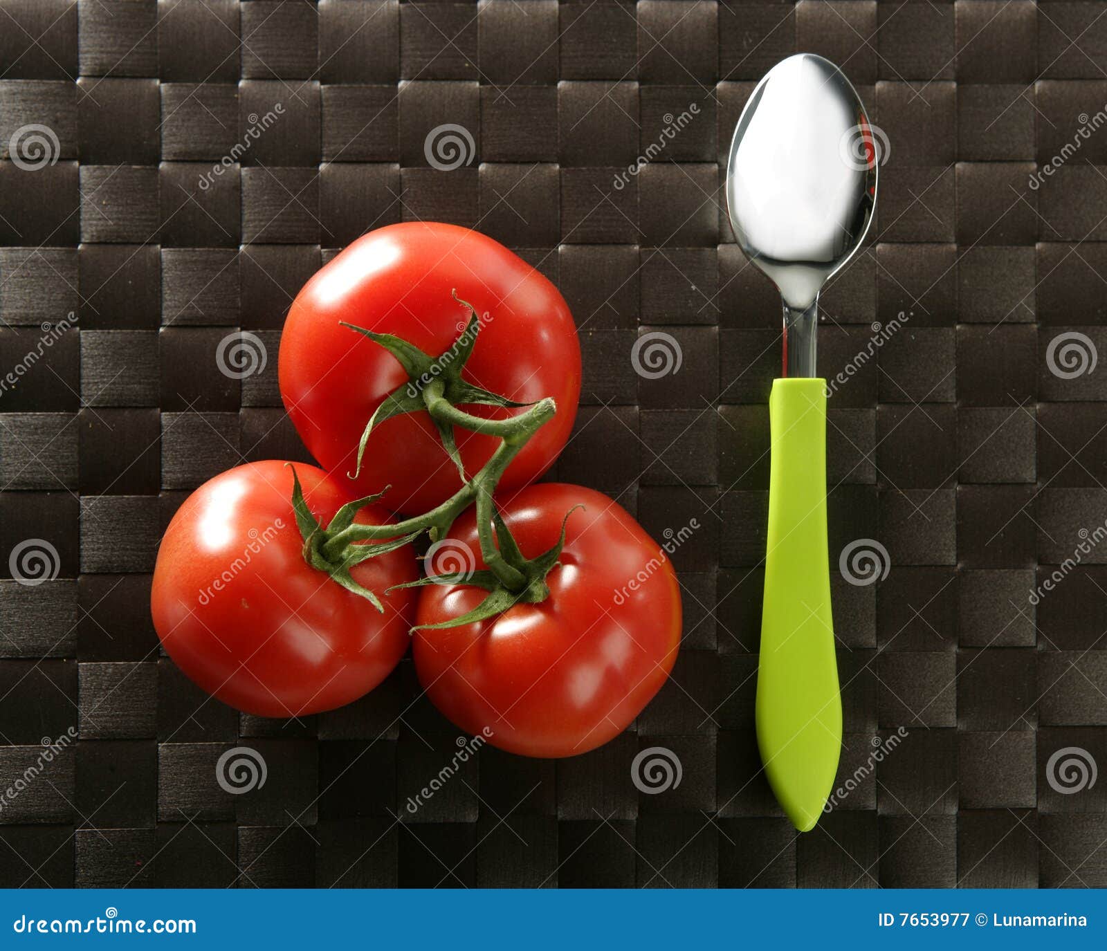 Three Red Tomatoes Branch with Green Spoon Stock Image - Image of ...
