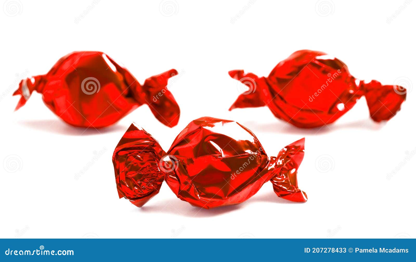 Three Red Wrapped Candy on a White Background Stock Image - Image of ...
