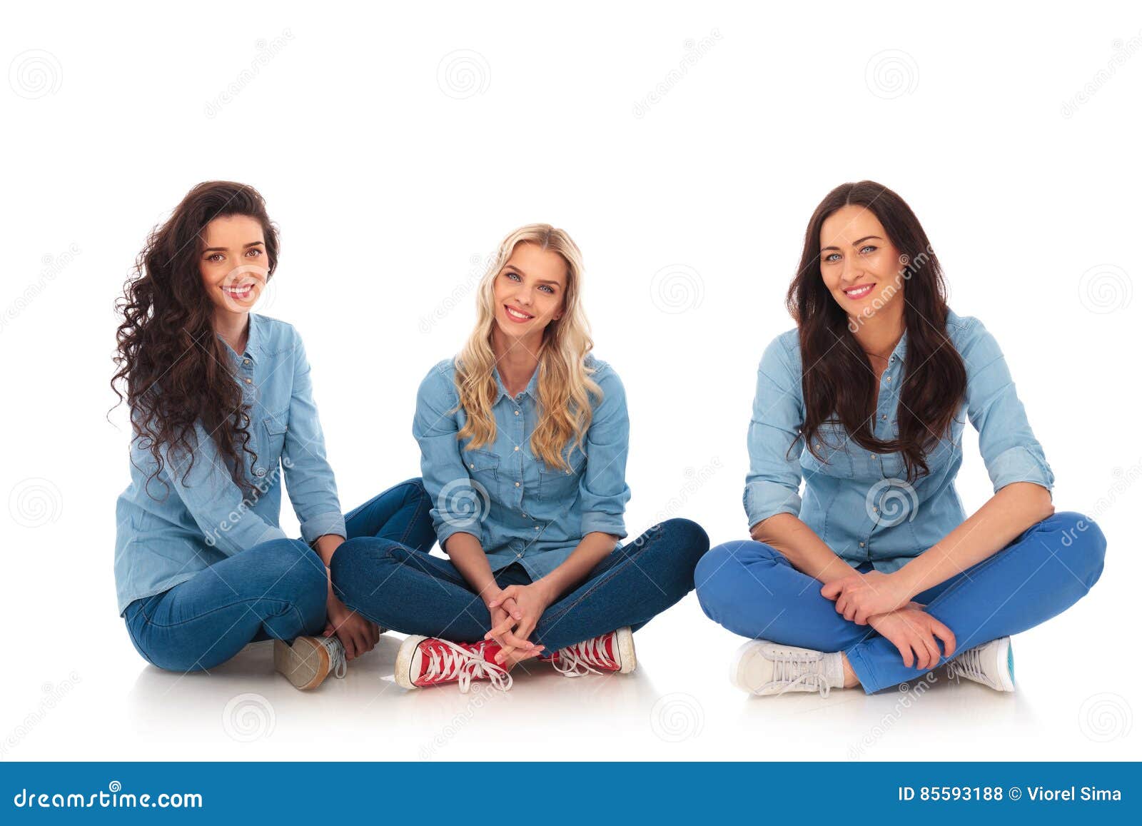 Three Relaxed Casual Women Sitting Stock Photo - Image of studio ...