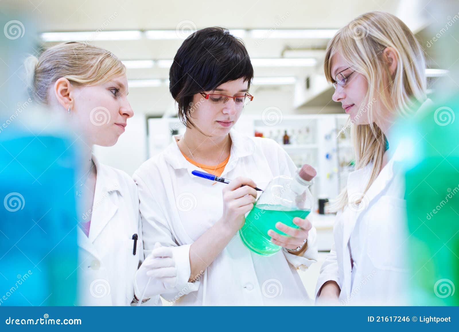Three Researchers/chemistry Students in a Lab Stock Photo - Image of ...