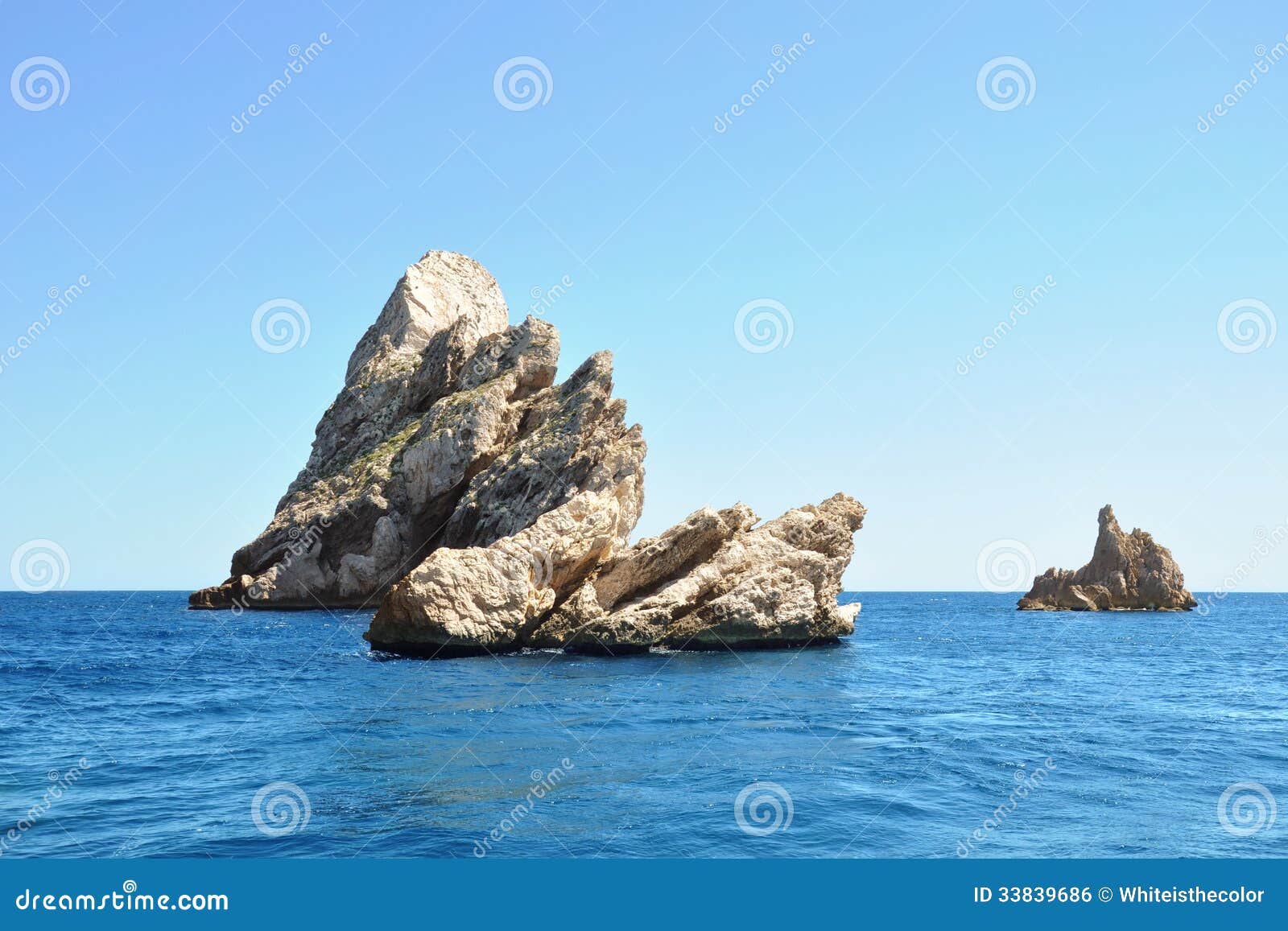 Three Rocks Surrounded by the Sea Stock Photo - Image of nature, rock ...